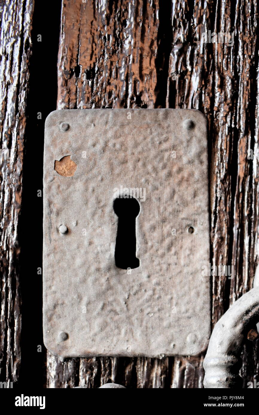 An old fashioned lock and key hole in the village of Frigiliana in ...