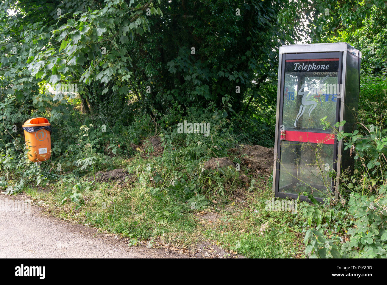 Secluded phone booth on a country lane Stock Photo - Alamy