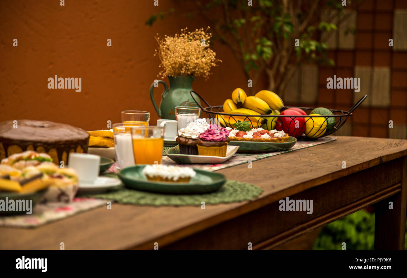 Breakfast table decorated tipical Stock Photo - Alamy