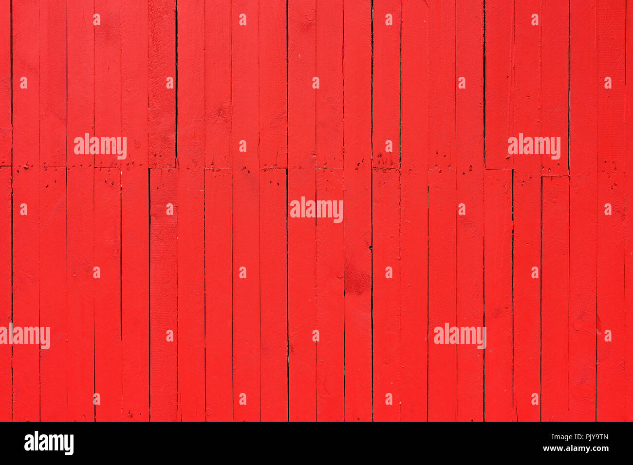 red wooden wall as background or texture Stock Photo - Alamy