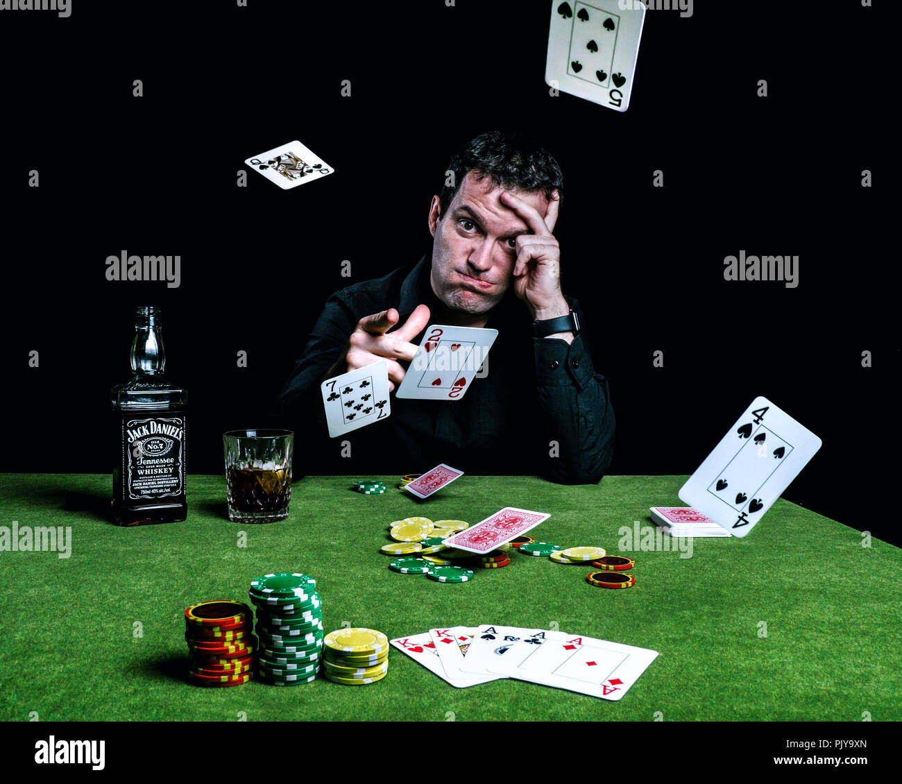 guys defeated at poker throwing his cards in the air whisky jack ...