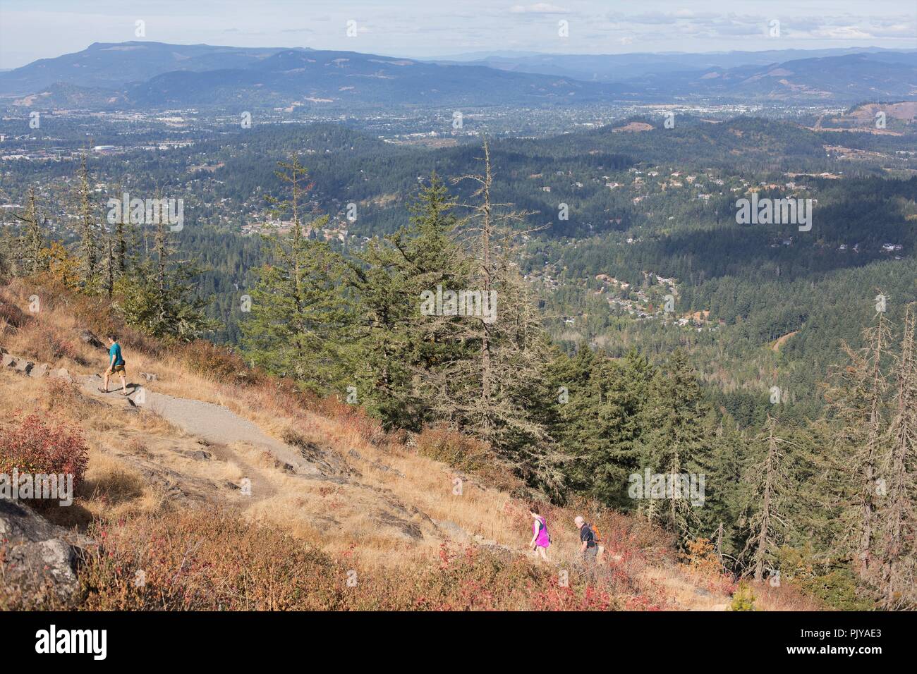 People hiking up a trail to the top of Spencer Butte in Eugene, Oregon ...