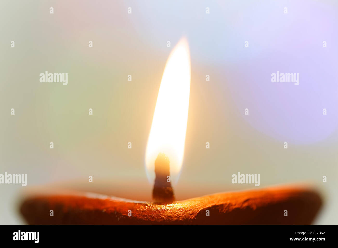 Indian traditional oil lamp in Diwali symbolizing spreading of light ...
