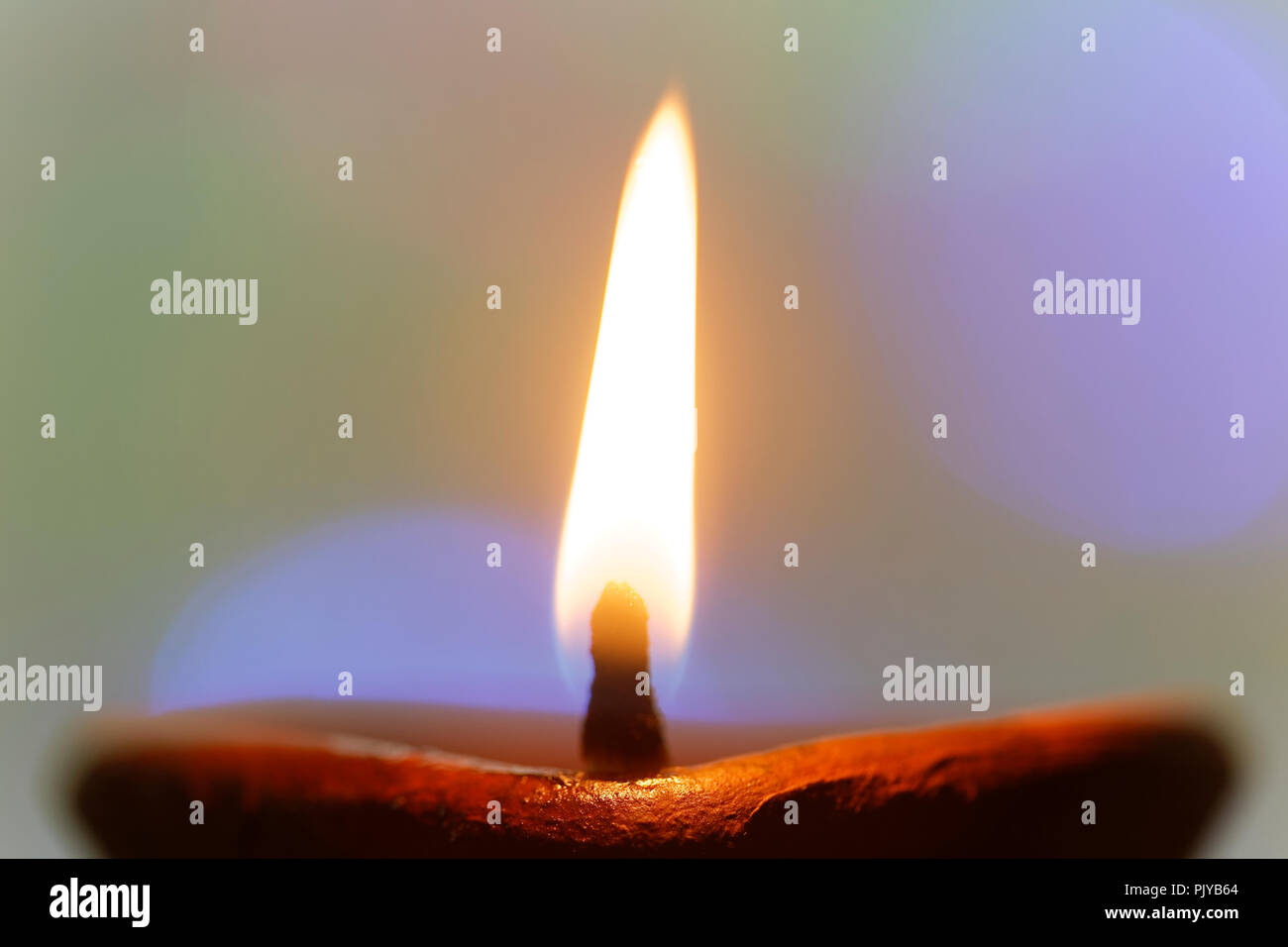 Indian traditional oil lamp in Diwali symbolizing spreading of light ...