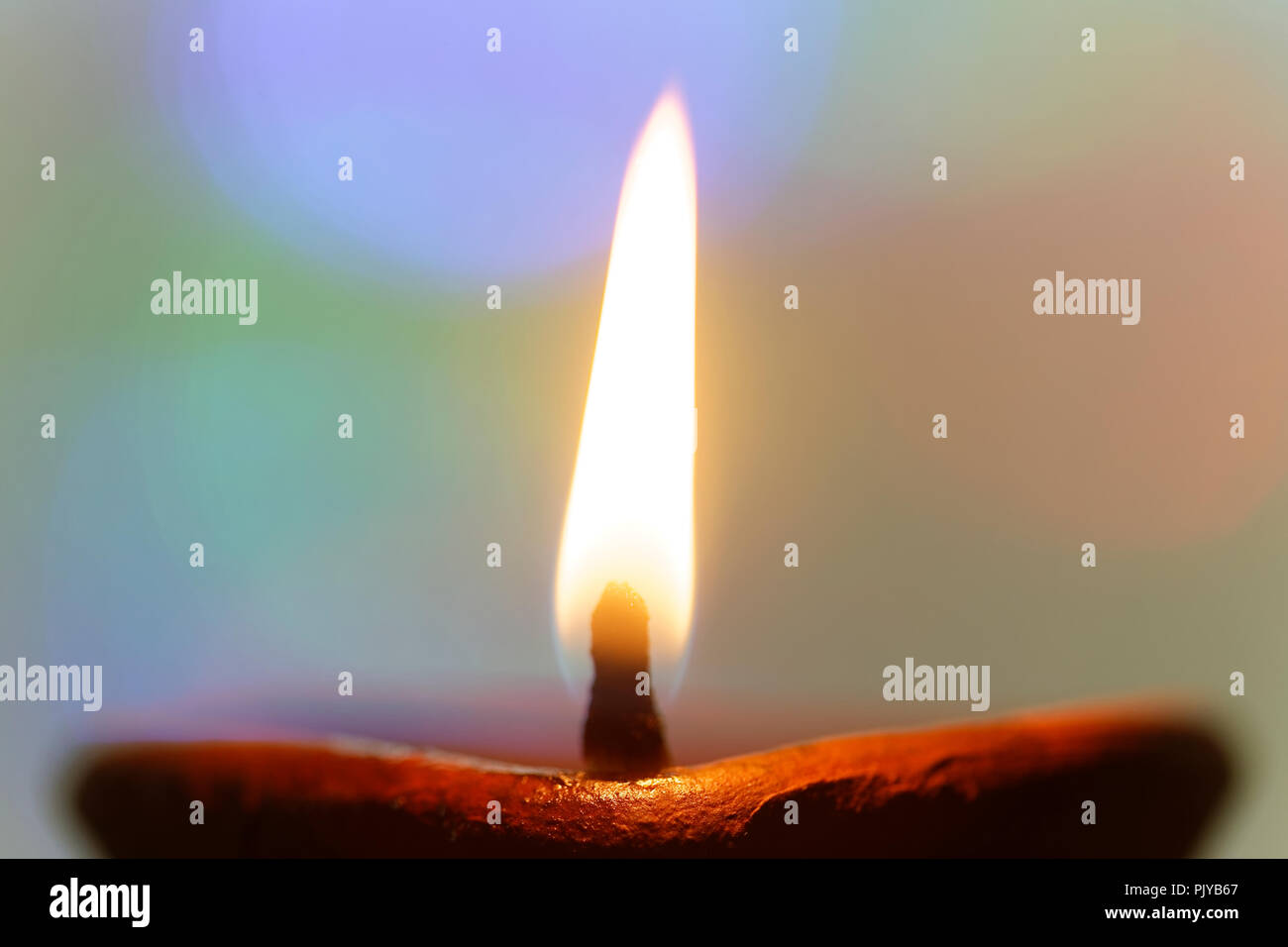 Indian traditional oil lamp in Diwali symbolizing spreading of light ...