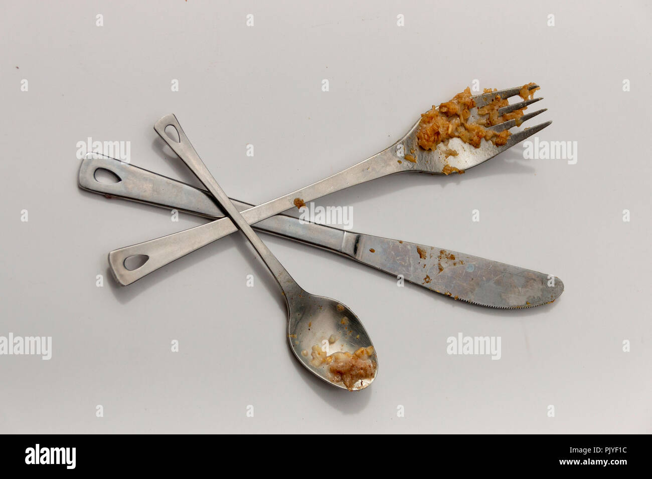 Crossed fork and spoon hi-res stock photography and images - Alamy