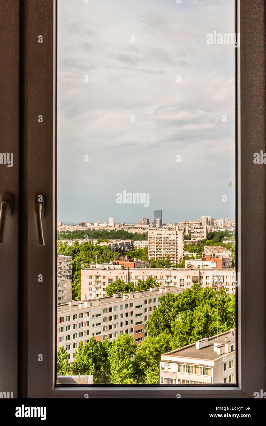 View of the city through the window Stock Photo - Alamy