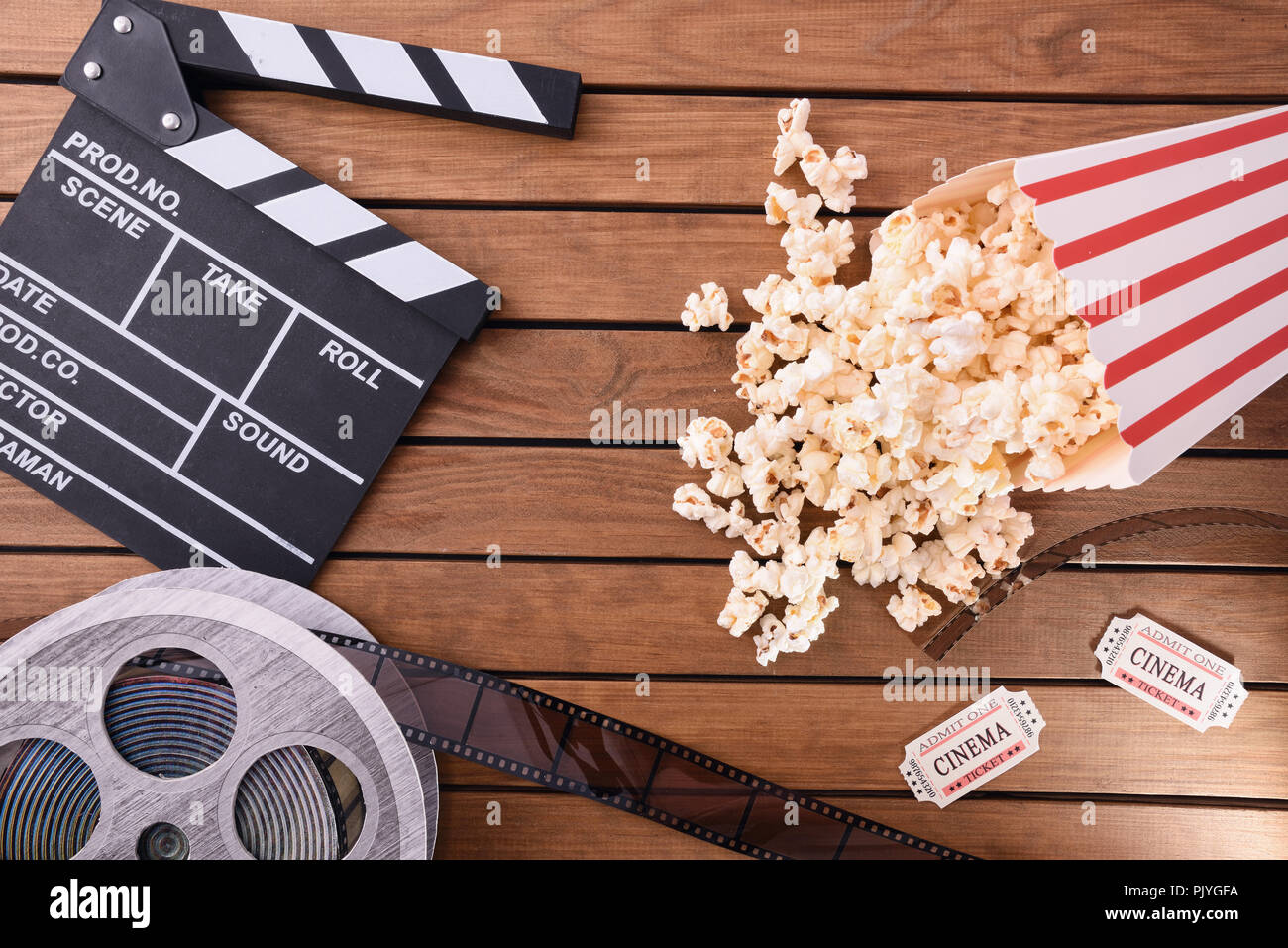 Cinema concept with related objects on wooden slat table. Concept of ...