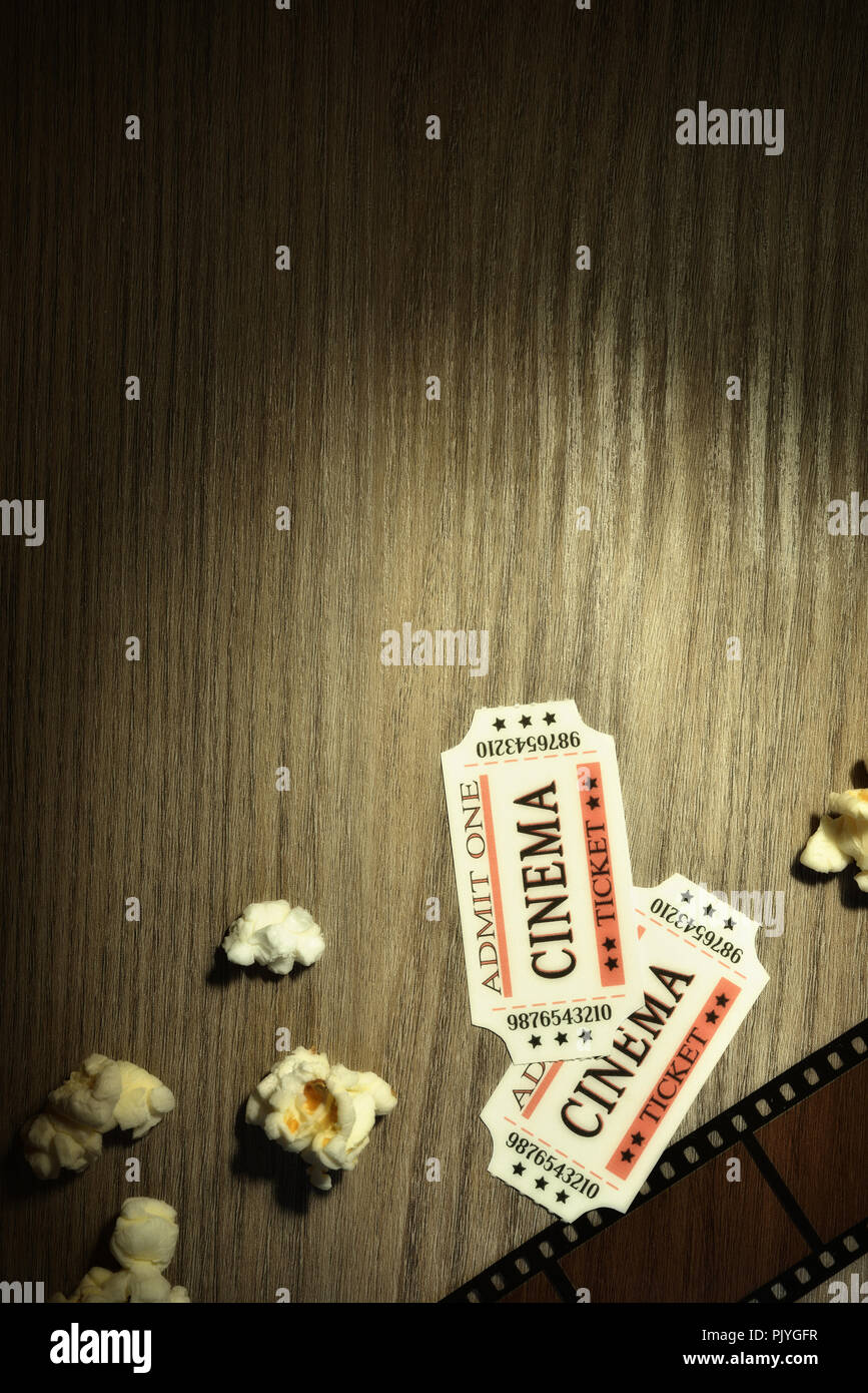 Vintage equipment and elements of cinema on wooden table. Concept of ...
