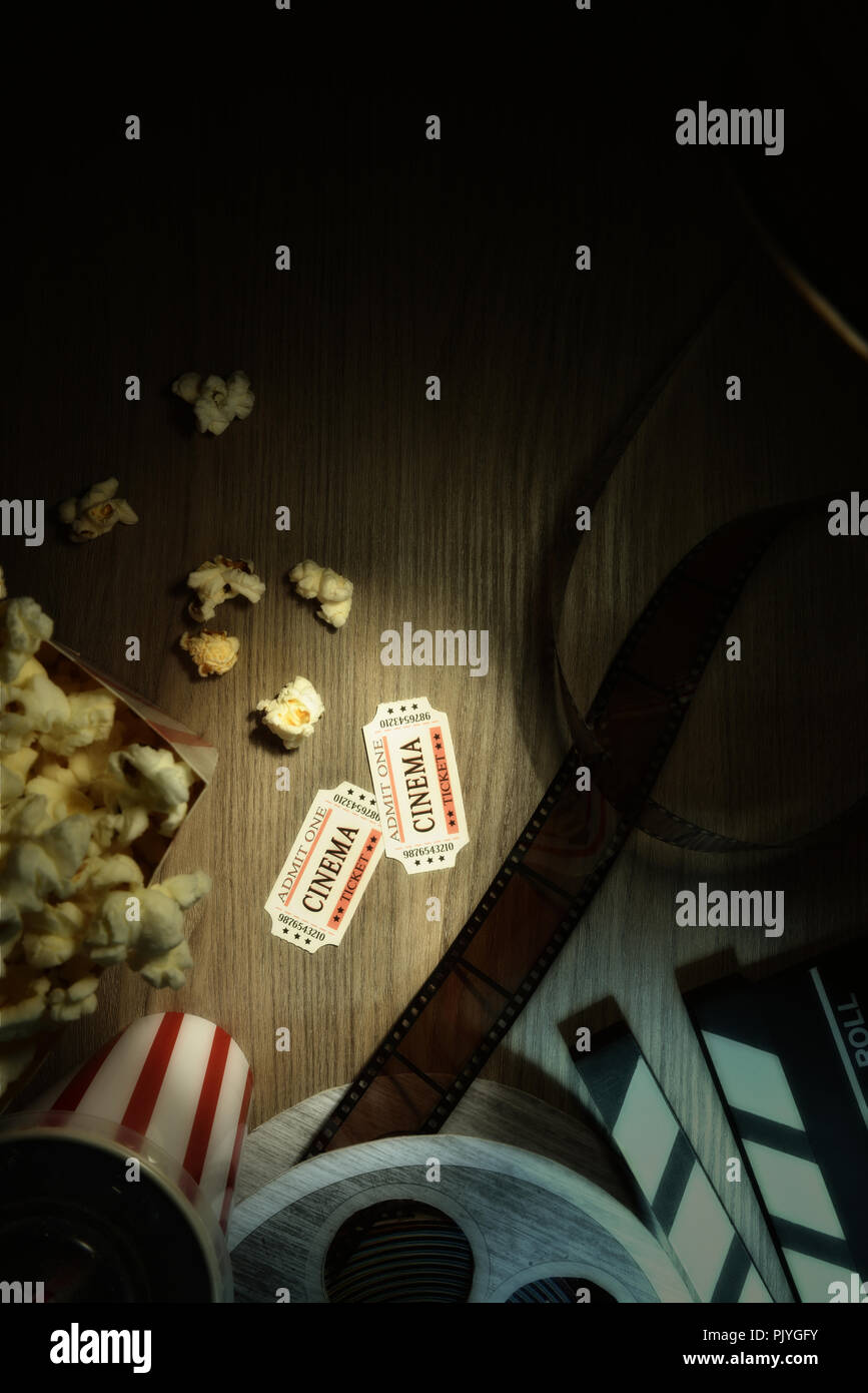 Vintage equipment and elements of cinema on wooden table. Concept of ...