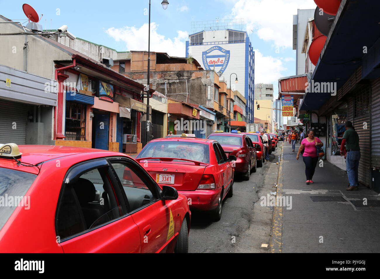 Red taxis queued in traffic, San Jose, Costa Rica Stock Photo - Alamy