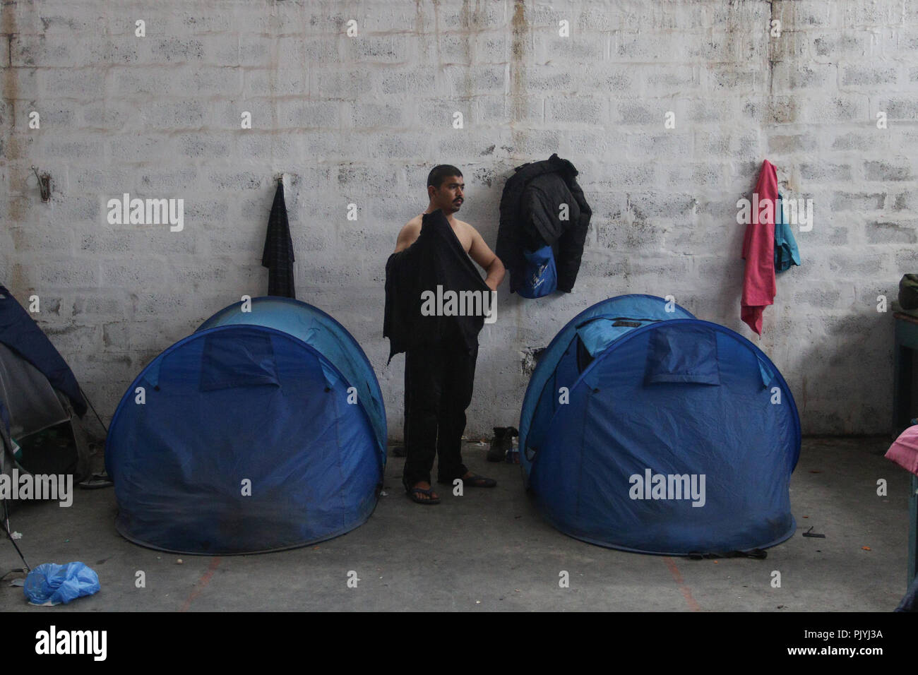 Patras, Achaea, Greece. 18th June, 2017. A migrant seen standing next ...
