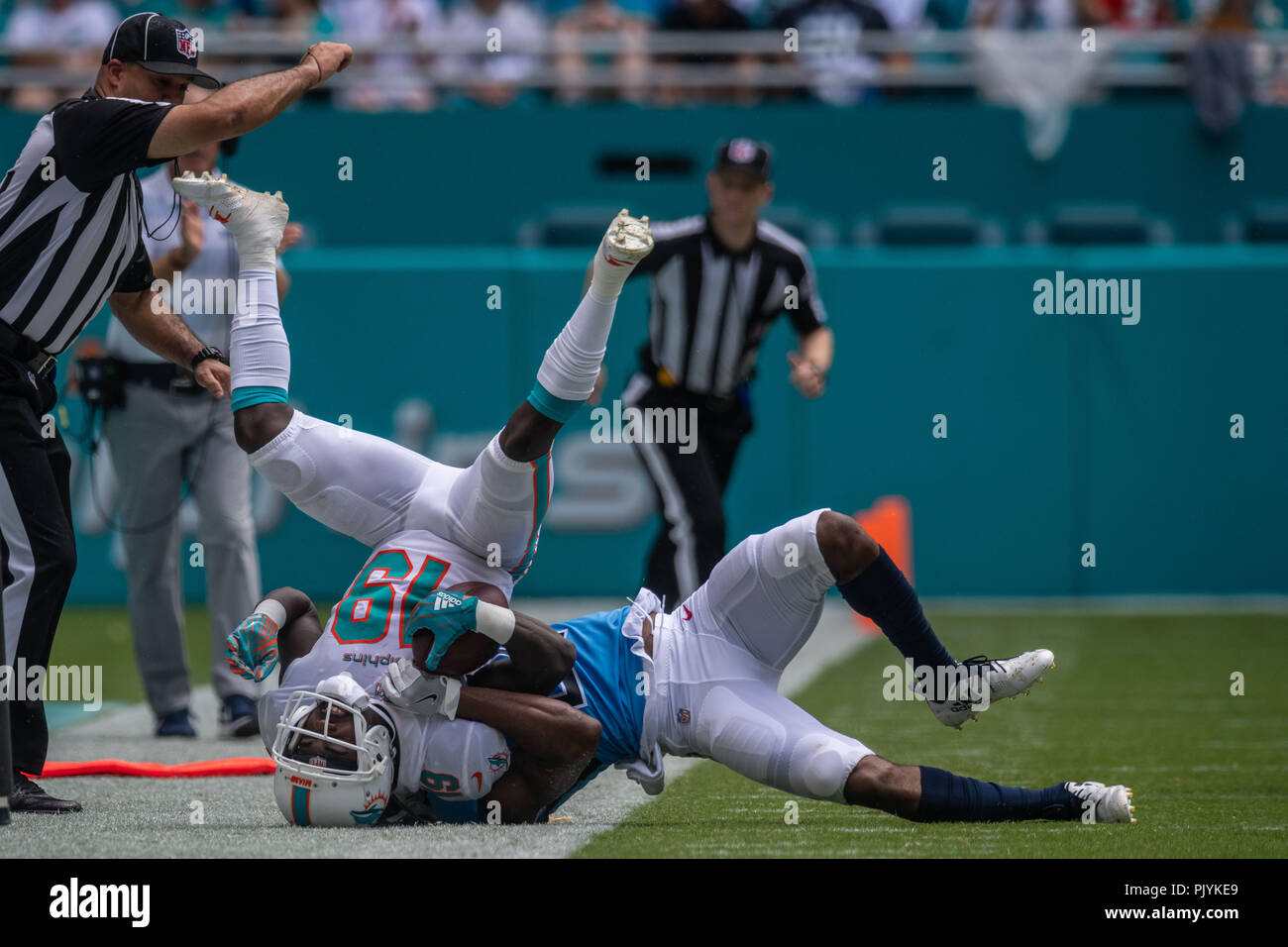 Miami, Florida, USA. 9th Sep, 2018. 21 Malcolm Butler slamming #19 ...