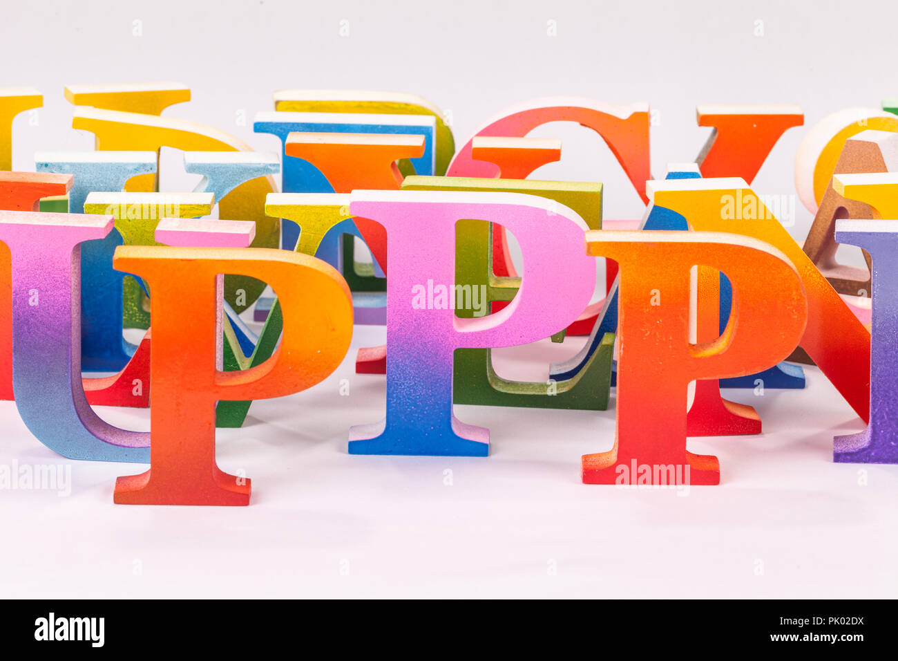 colorful uppercase english letters on white background Stock Photo - Alamy
