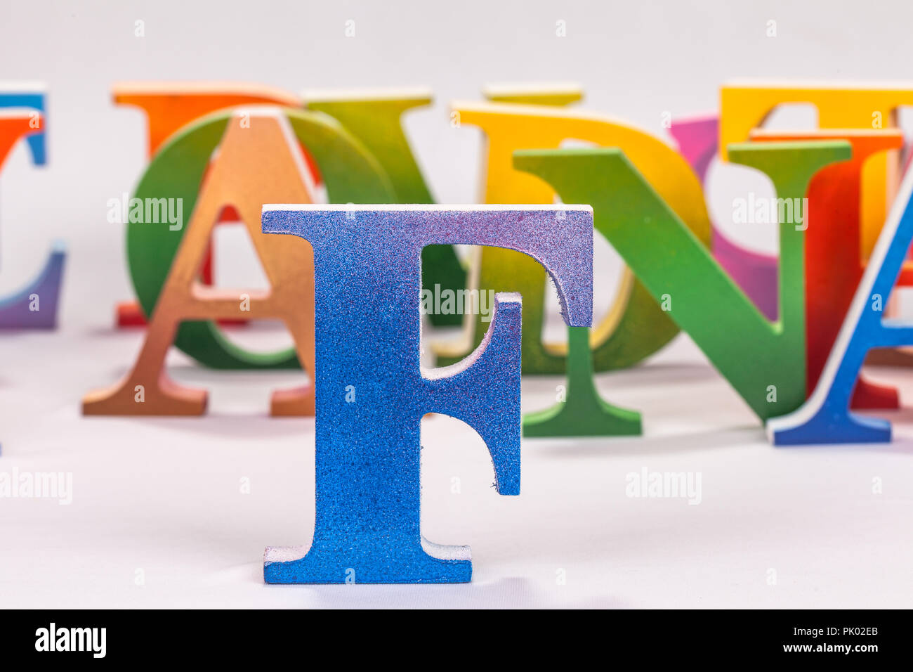 colorful uppercase english letters on white background Stock Photo - Alamy