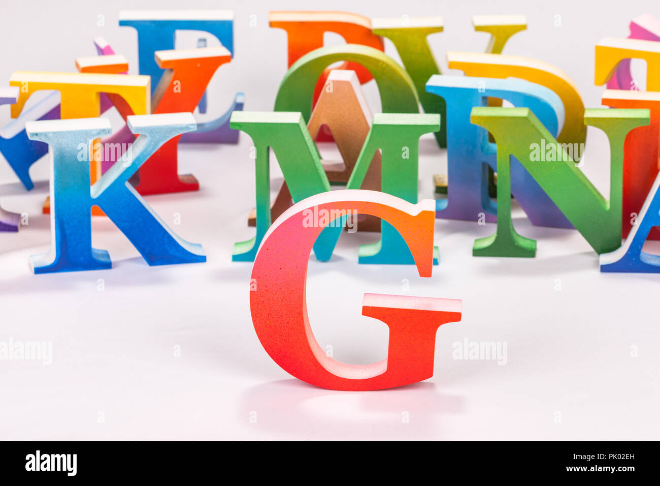 colorful uppercase english letters on white background Stock Photo - Alamy