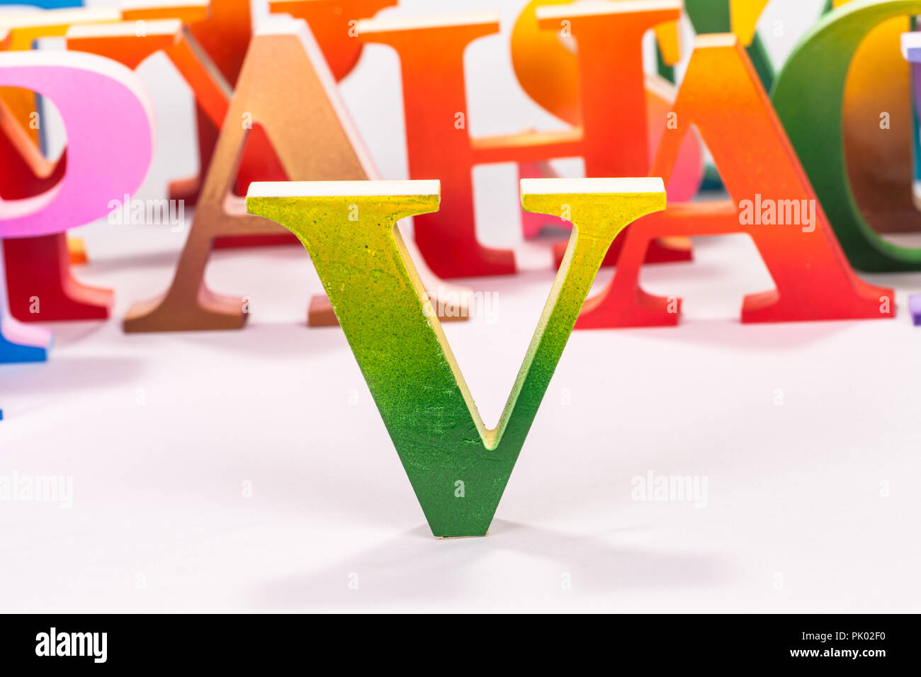 colorful uppercase english letters on white background Stock Photo - Alamy