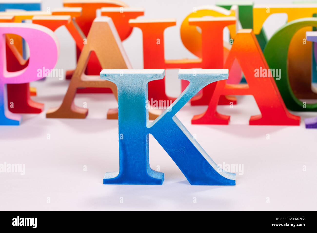 colorful uppercase english letters on white background Stock Photo - Alamy