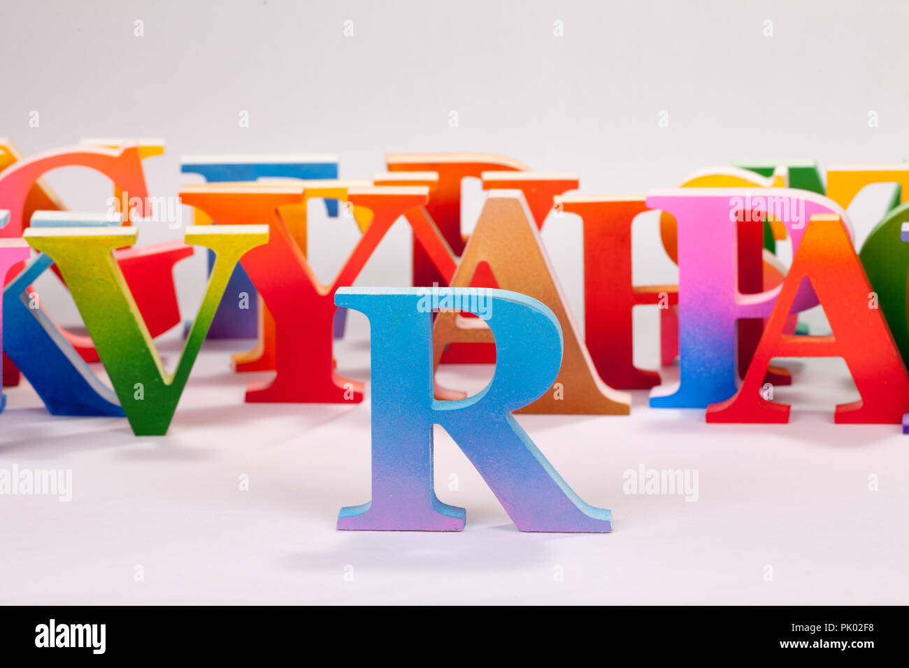 colorful uppercase english letters on white background Stock Photo - Alamy