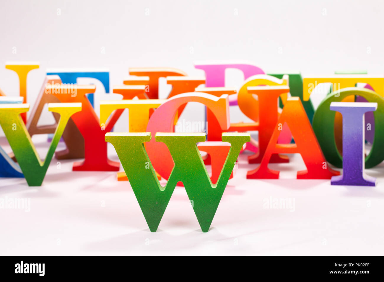 colorful uppercase english letters on white background Stock Photo - Alamy