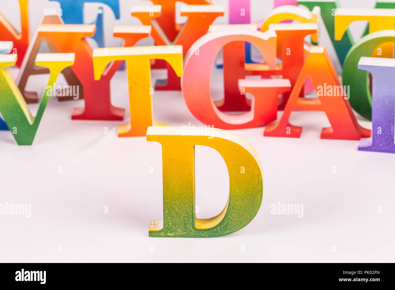 colorful uppercase english letters on white background Stock Photo - Alamy