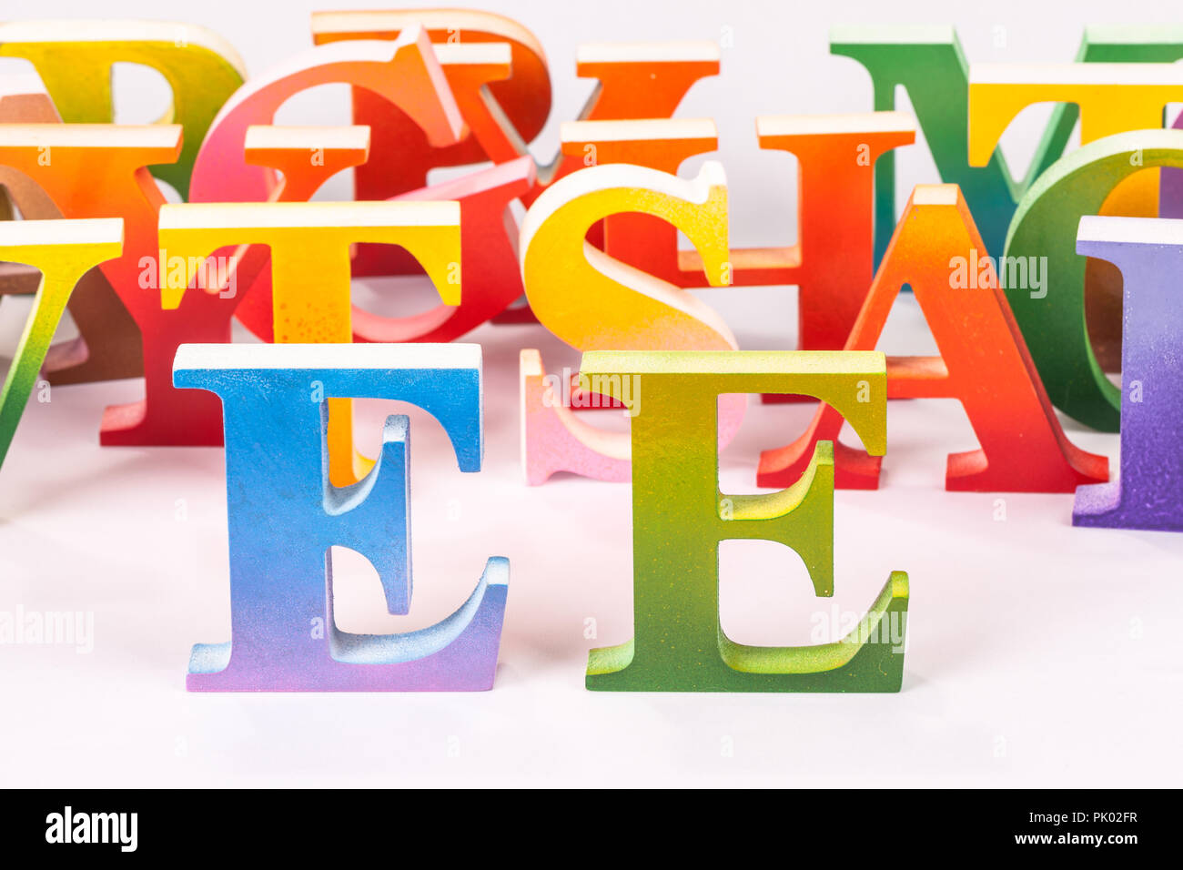 colorful uppercase english letters on white background Stock Photo - Alamy