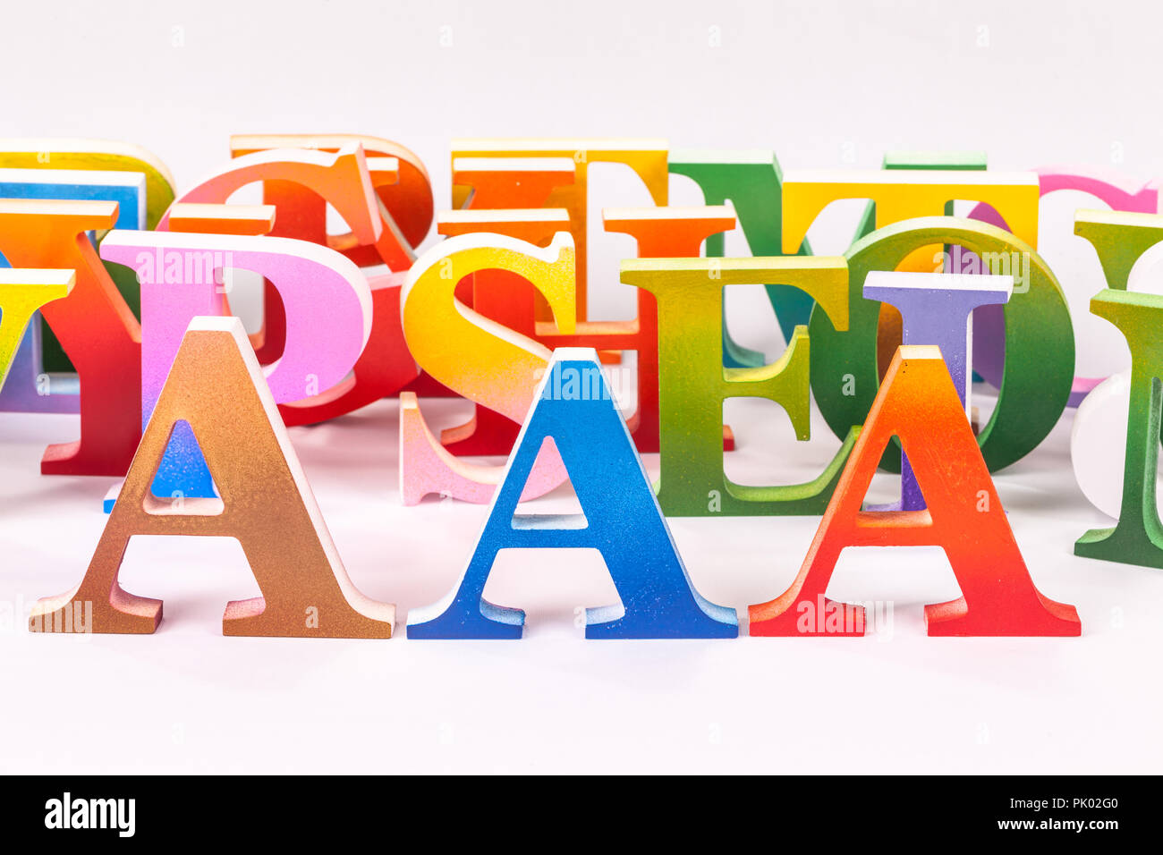 colorful uppercase english letters on white background Stock Photo - Alamy