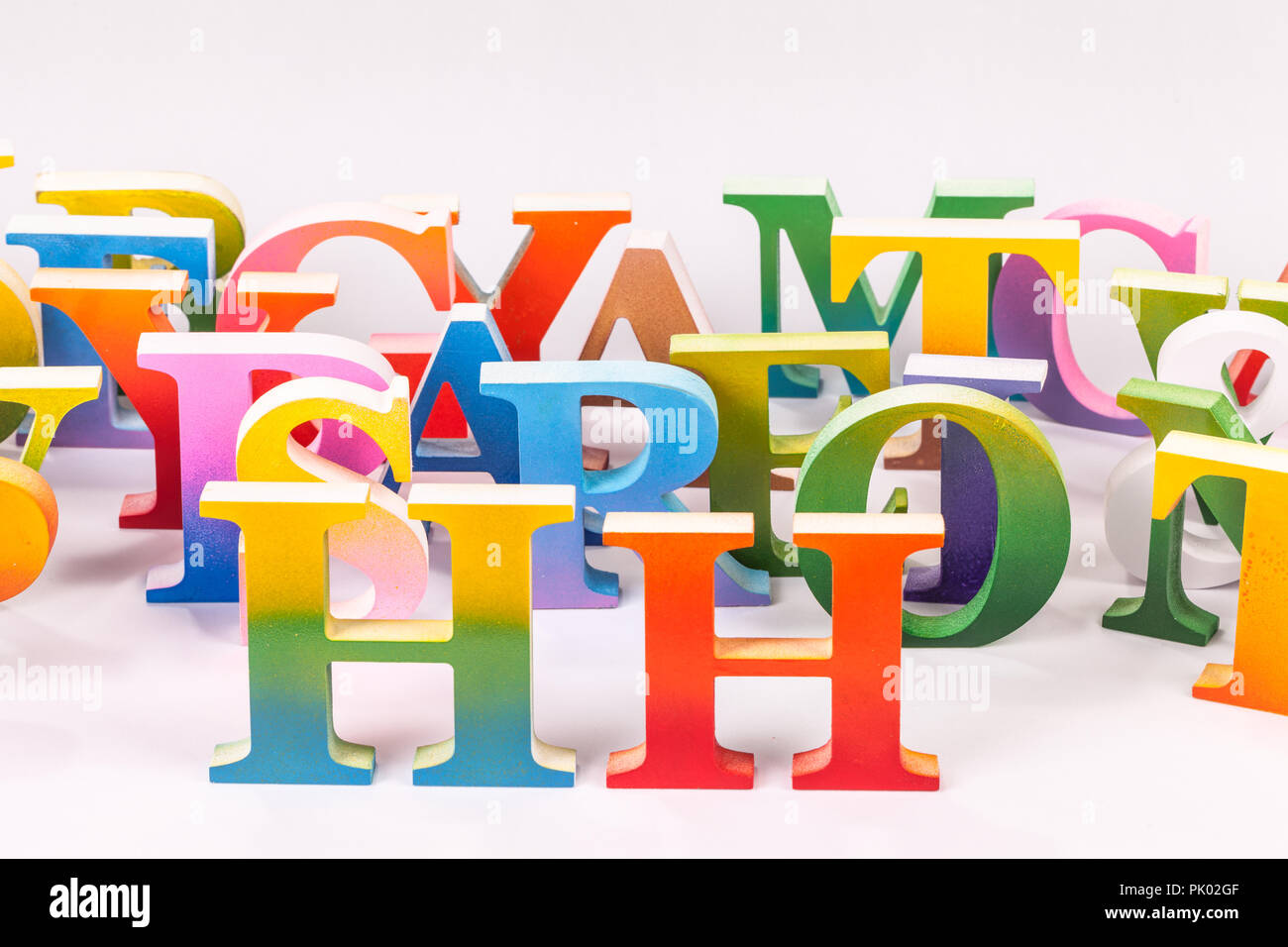 colorful uppercase english letters on white background Stock Photo - Alamy