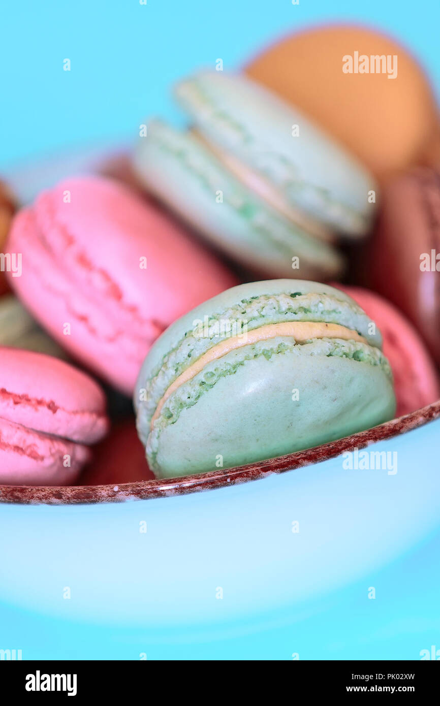 Cake macaron or macaroon on turquoise background, pastel colors, tasty ...