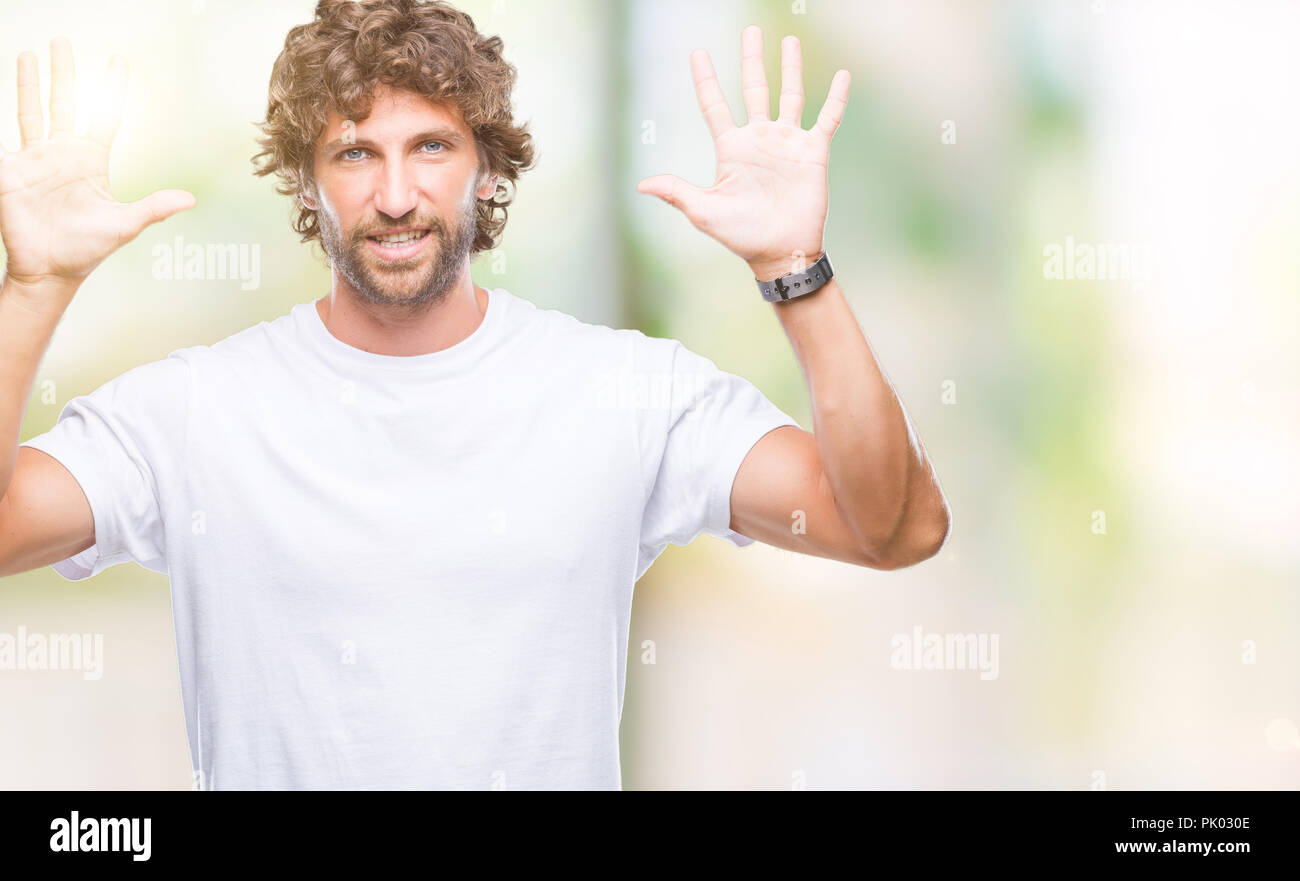 Handsome hispanic model man over isolated background showing and ...