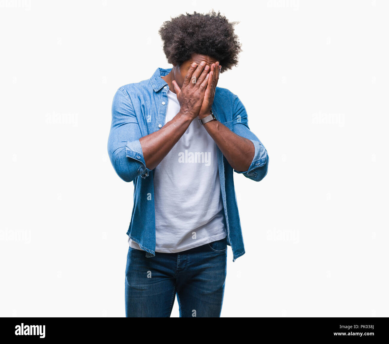 Afro american man over isolated background with sad expression covering ...