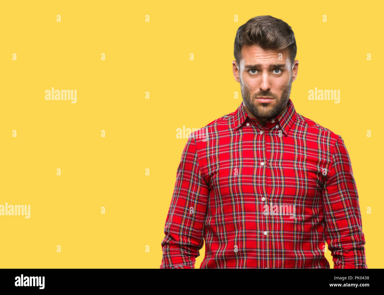 Young handsome man over isolated background depressed and worry for ...