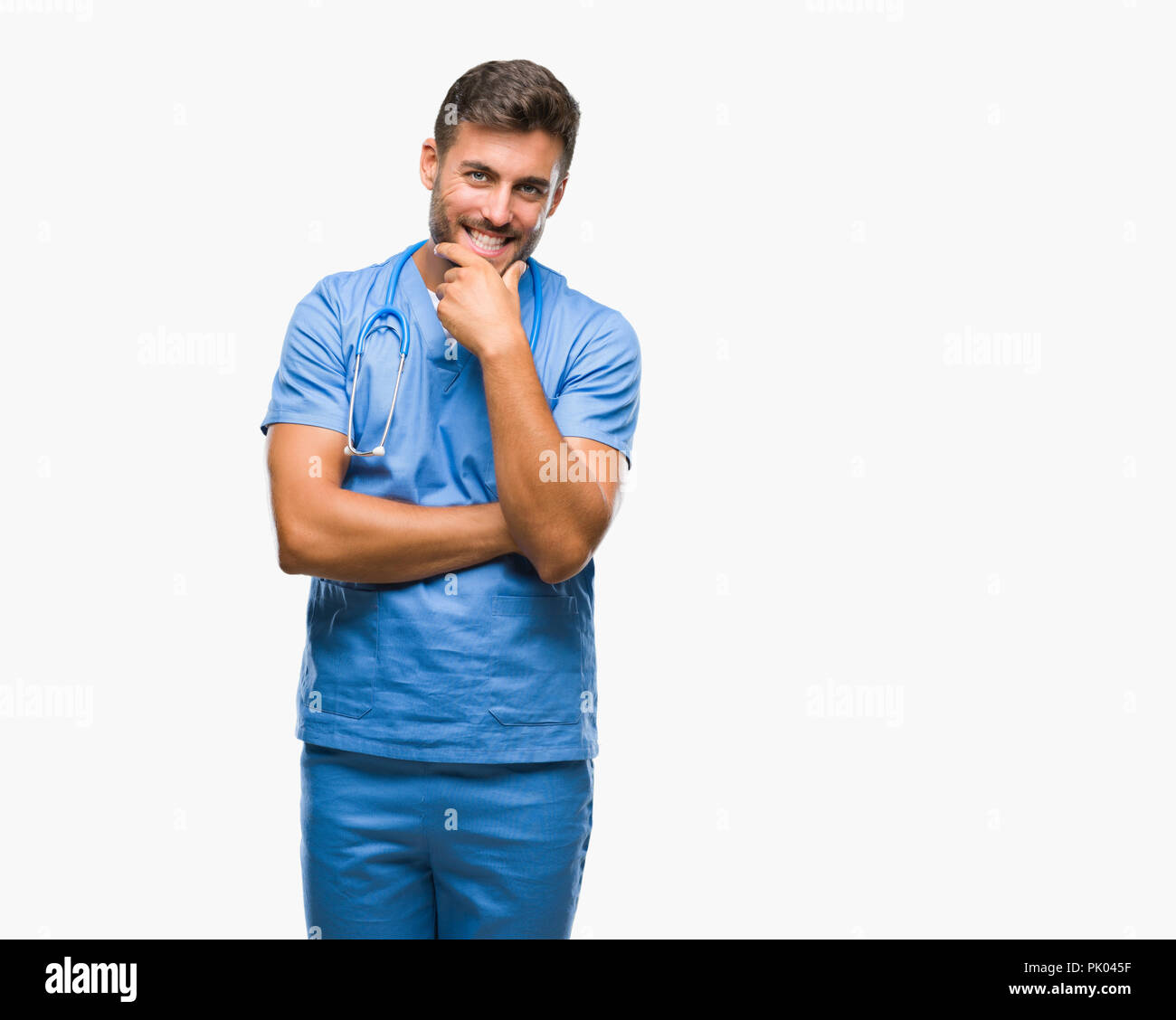 Young handsome doctor surgeon man over isolated background looking ...