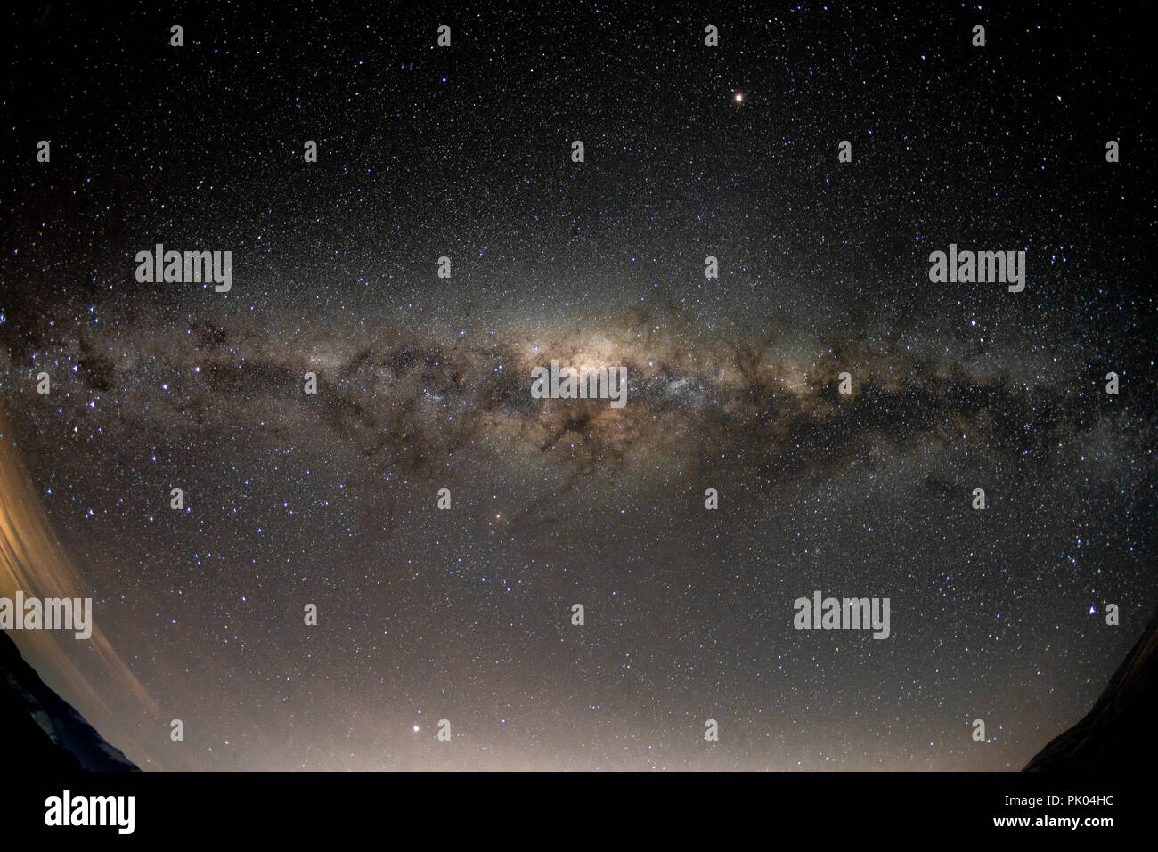 A super wide angle view of the Milky Way galaxy as it appears over the ...