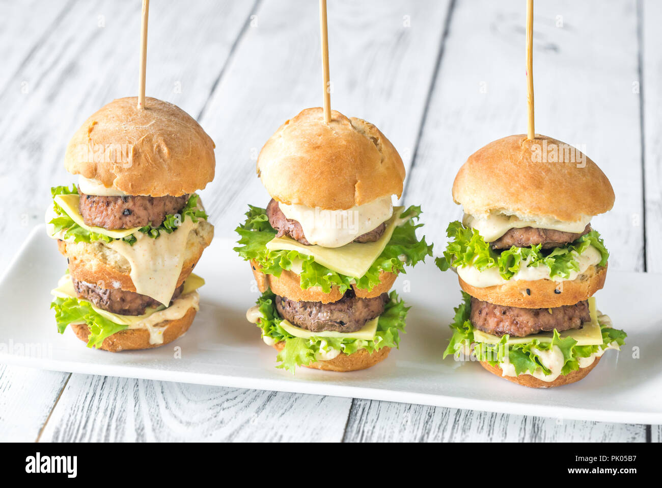 Row of burgers hi-res stock photography and images - Alamy