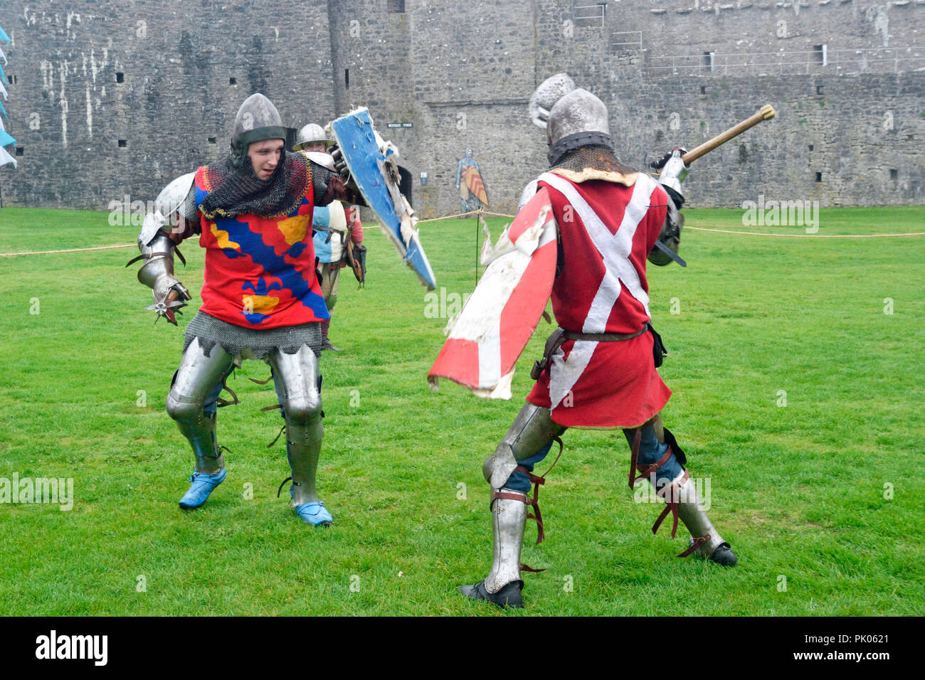 Living history weekend. Medieval knights in battle at Pembroke Castle ...