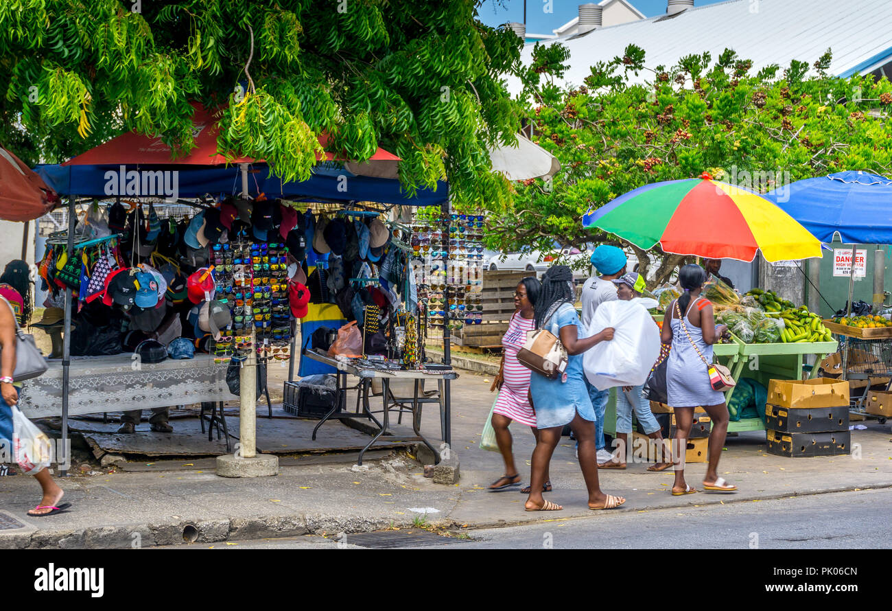 Market stalls and traders on Cheapside road near the old town hall, Old ...