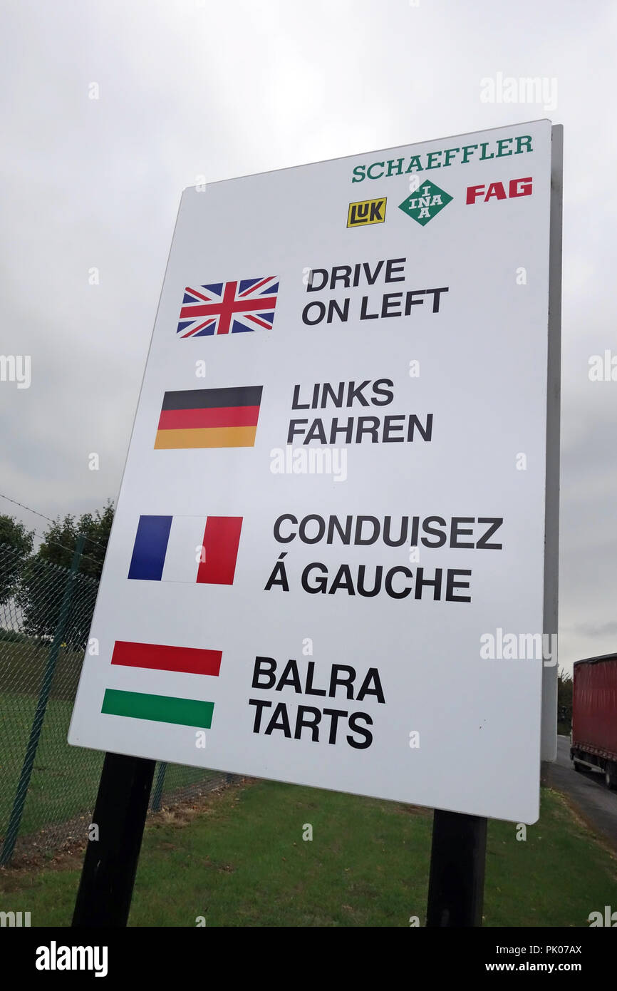 White Drive on the Left Road Sign with Union Jack Flag and other ...