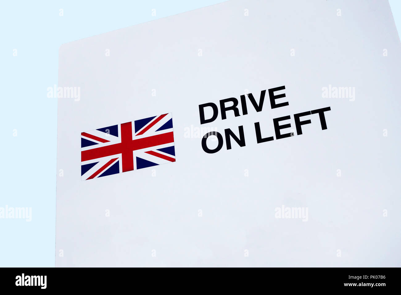 White Drive on the Left Road Sign with Union Jack Flag seen on UK roads ...