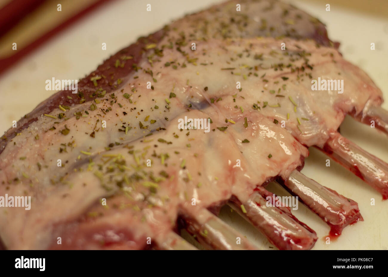 Uncooked Rack of Lamb Stock Photo - Alamy