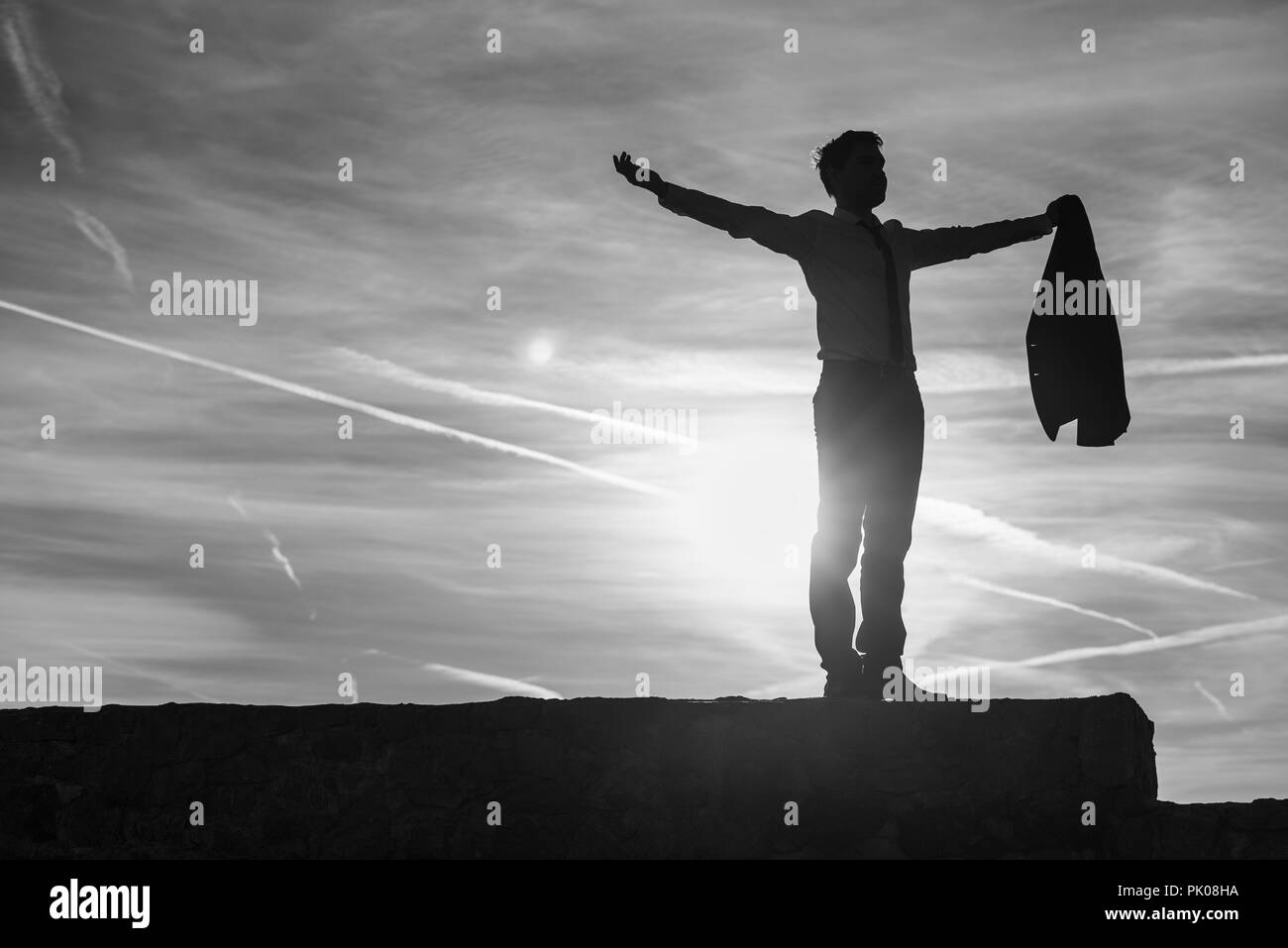 Man backlit standing suit hi-res stock photography and images - Alamy