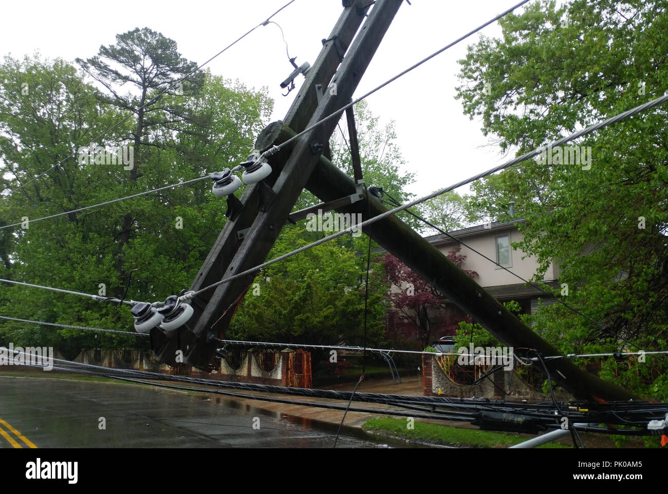 The storm caused severe damage to electric poles power lines over a ...