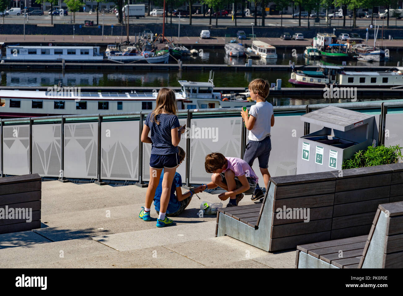 Child throwing garbage hi-res stock photography and images - Alamy