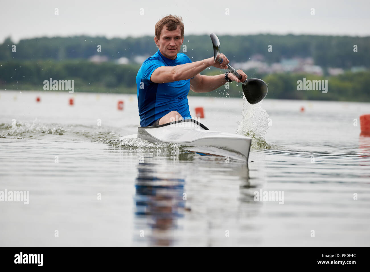 Man paddling in kayak Stock Photo - Alamy