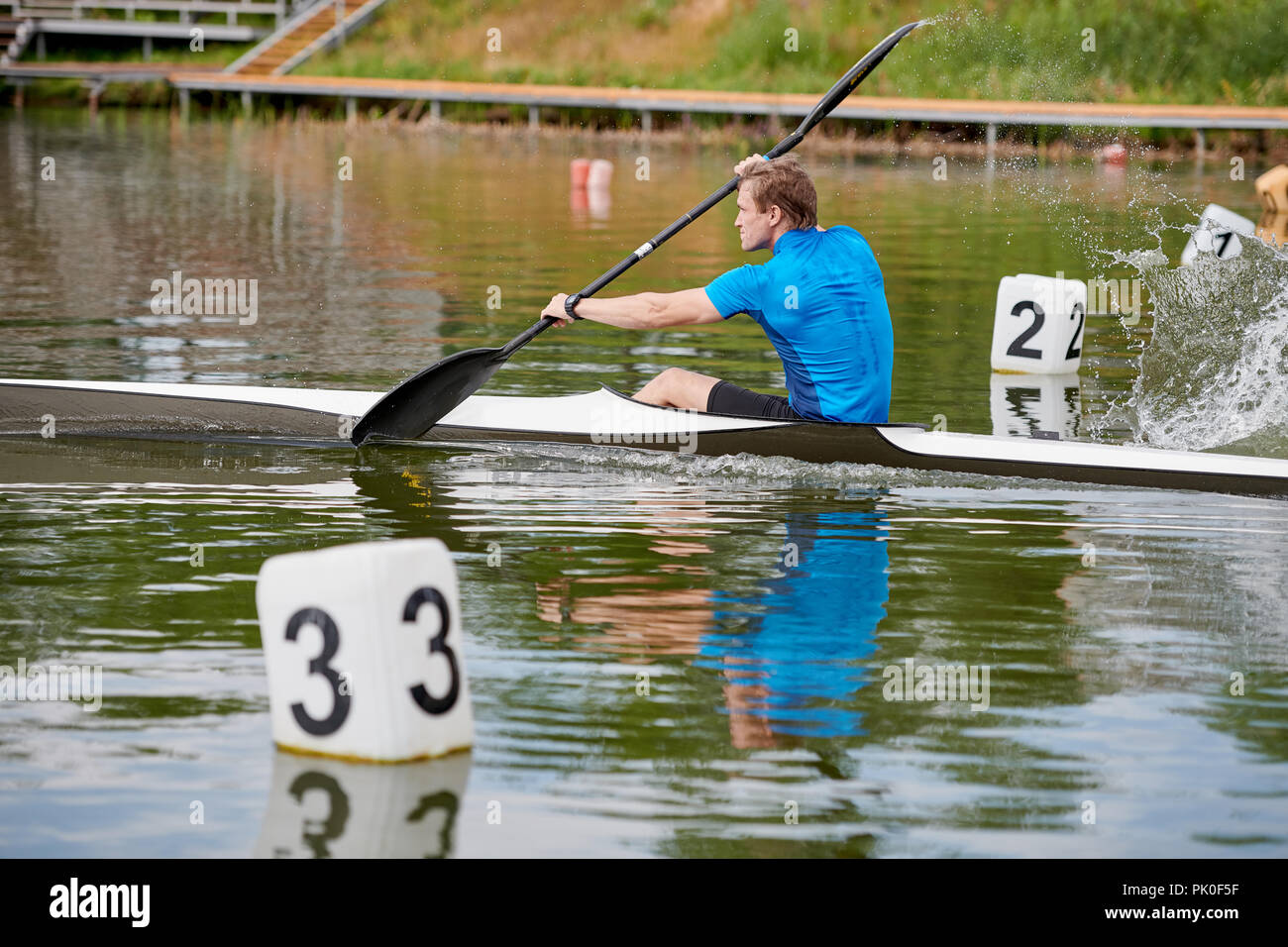 Man at rowing competition Stock Photo - Alamy
