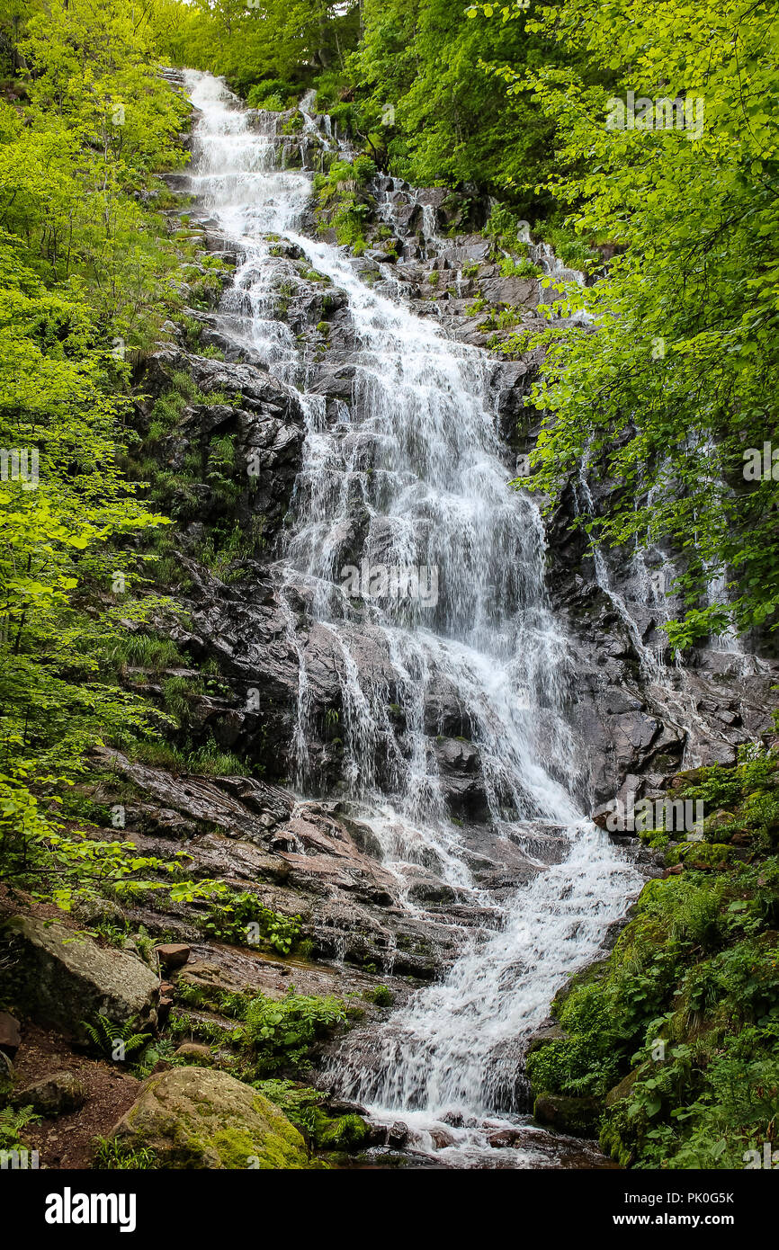 Powerful Piljski waterfall cascading down the rocky cliff during spring ...