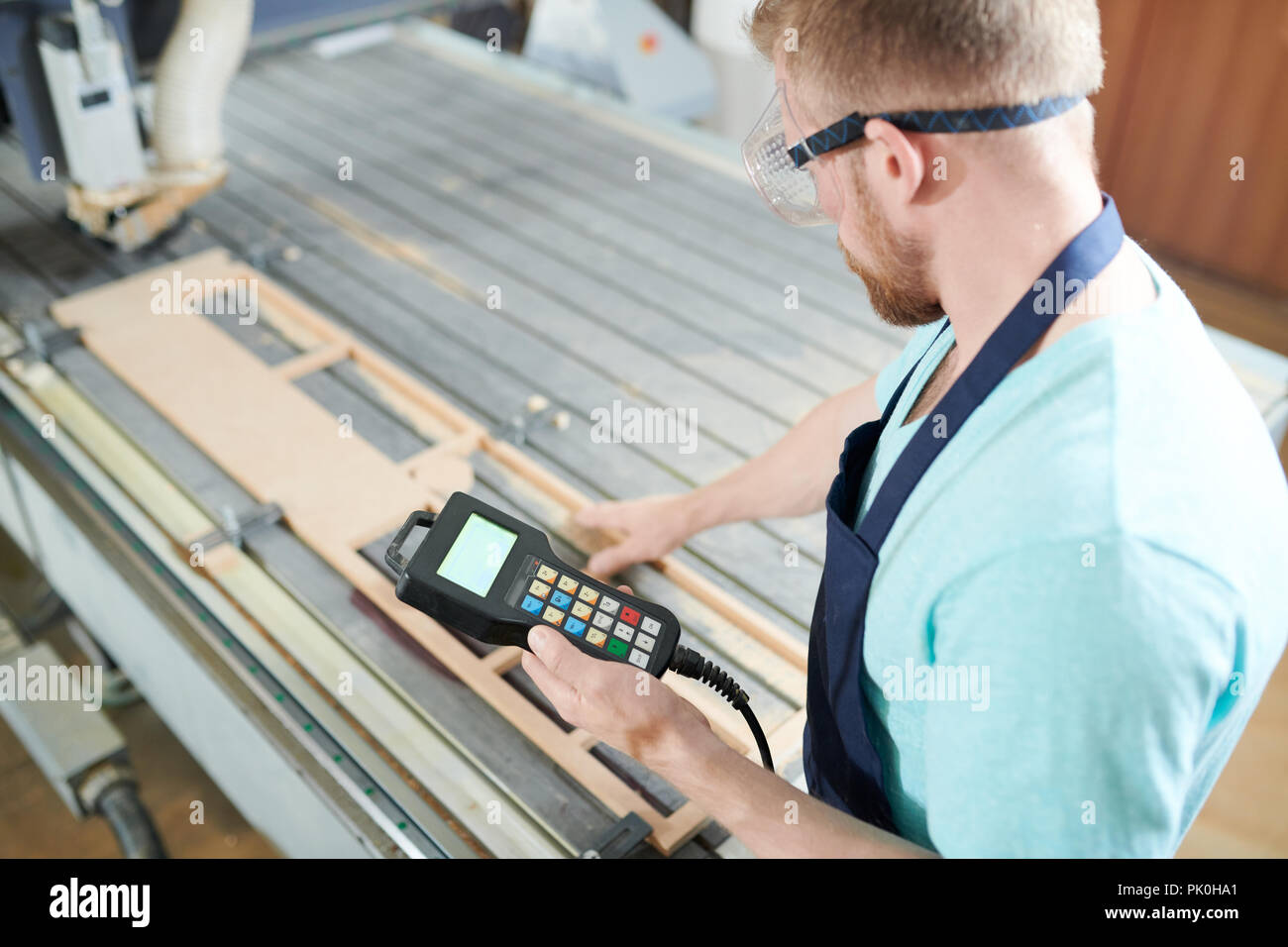 Man operating the work Stock Photo - Alamy