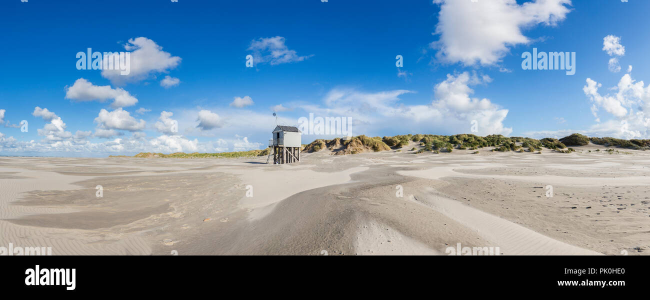 A refuge cabin for stranded castaways on an isolated beach on ...