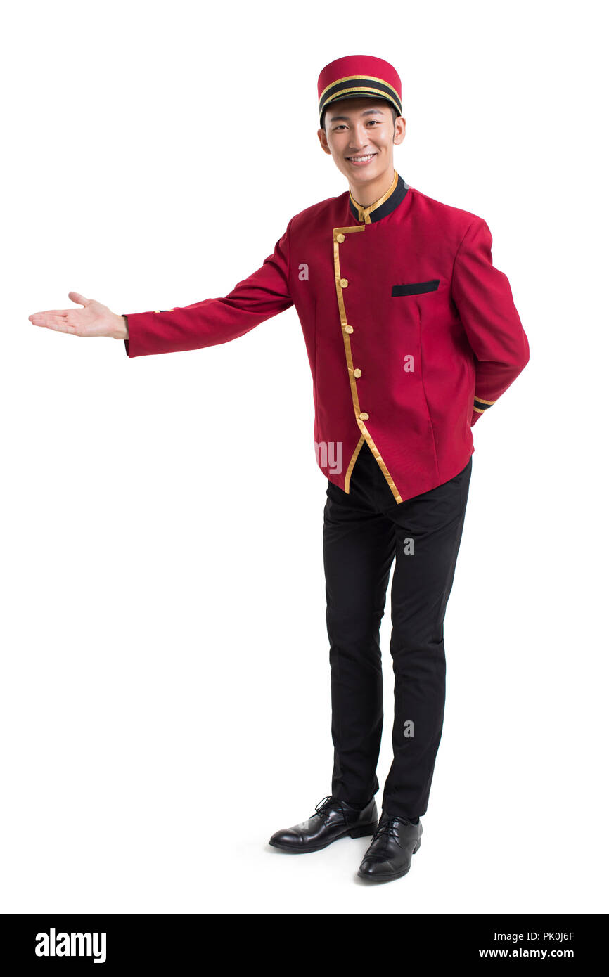 Young bellboy greeting Stock Photo - Alamy