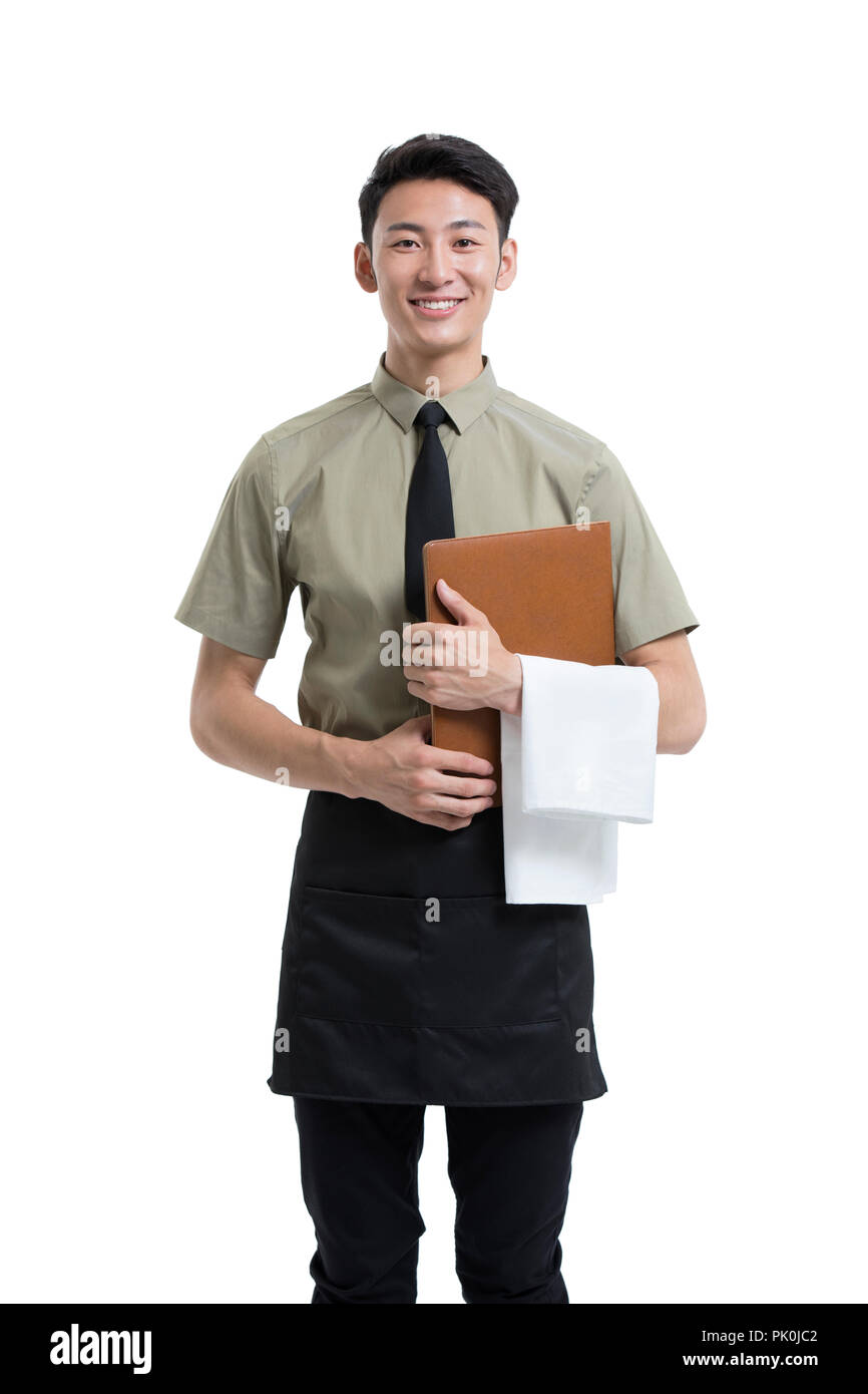 Young waiter holding a menu Stock Photo - Alamy